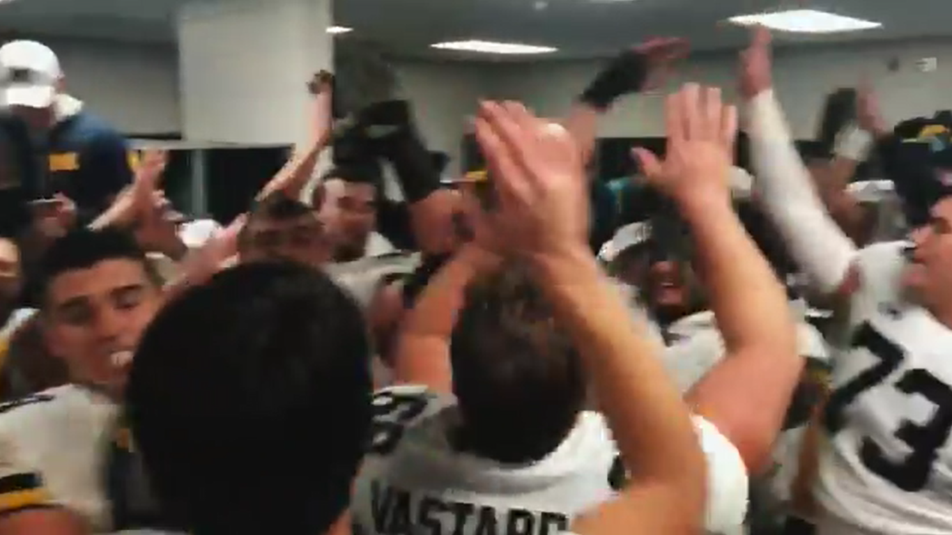 WATCH: Michigan locker room celebrates win over MSU with Paul Bunyan Trophy