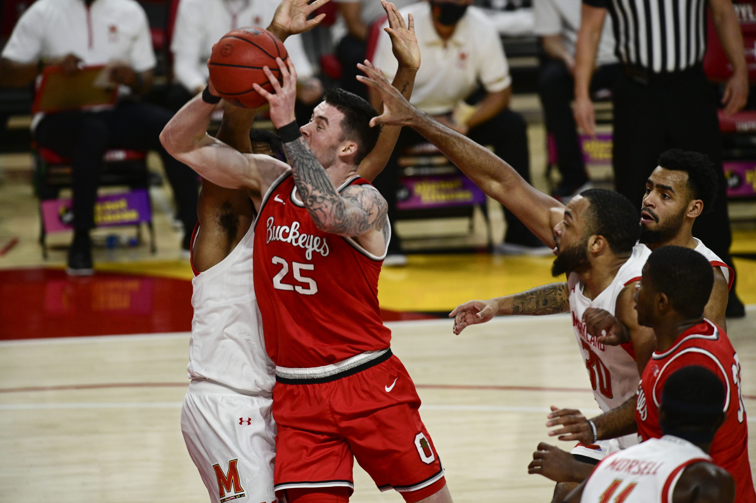 Ohio State's CJ Walker, Kyle Young still weighing future plans