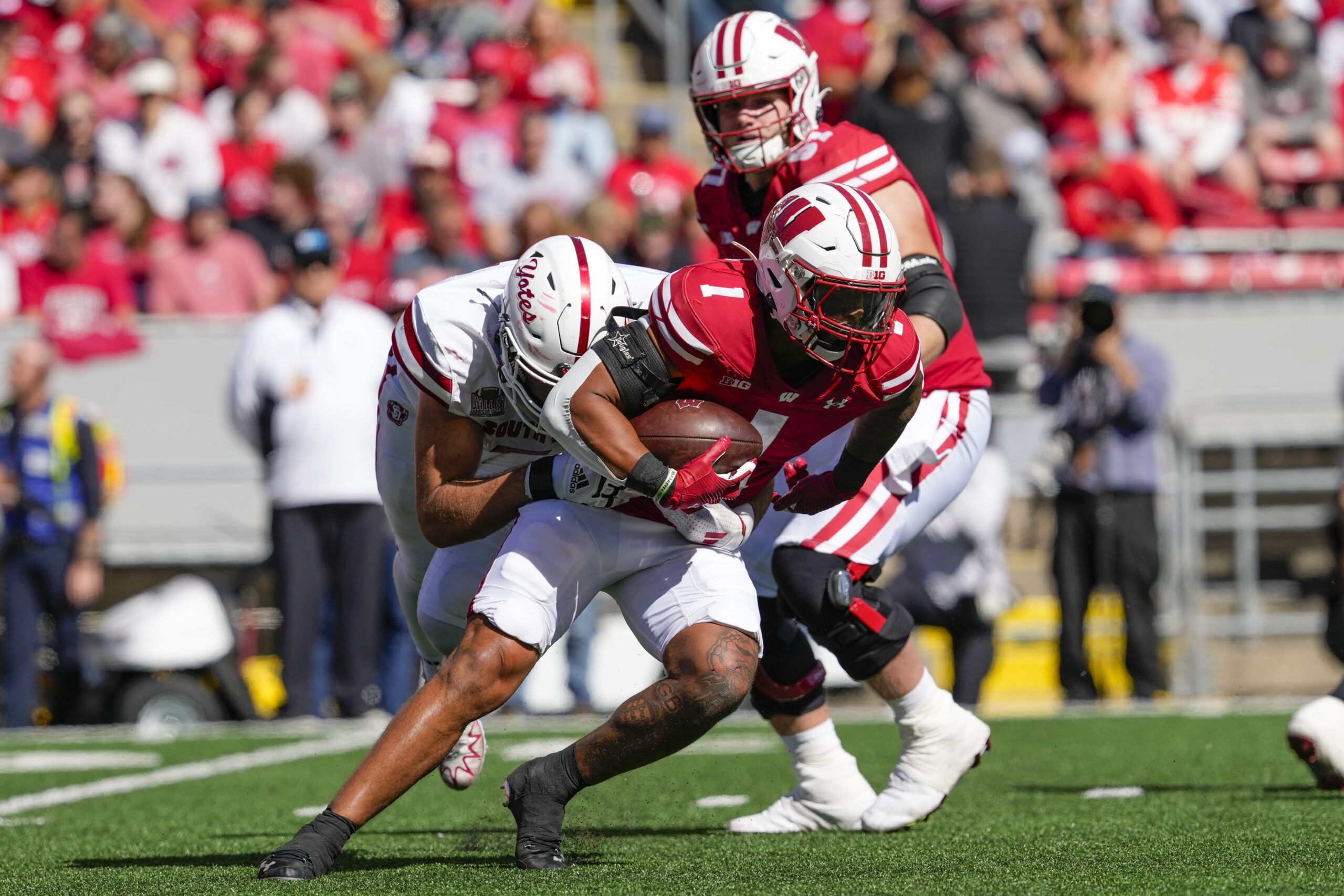 Wisconsin RB Chez Mellusi, team's leading rusher, stepping away from ...